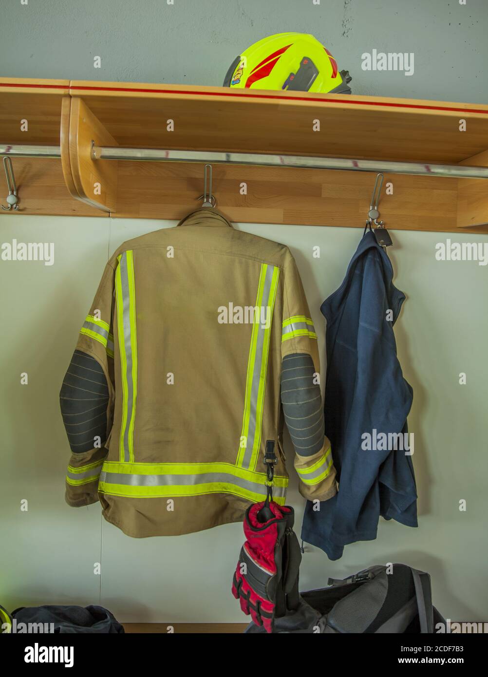 Closeup shot of a hanging rack with uniforms Stock Photo - Alamy