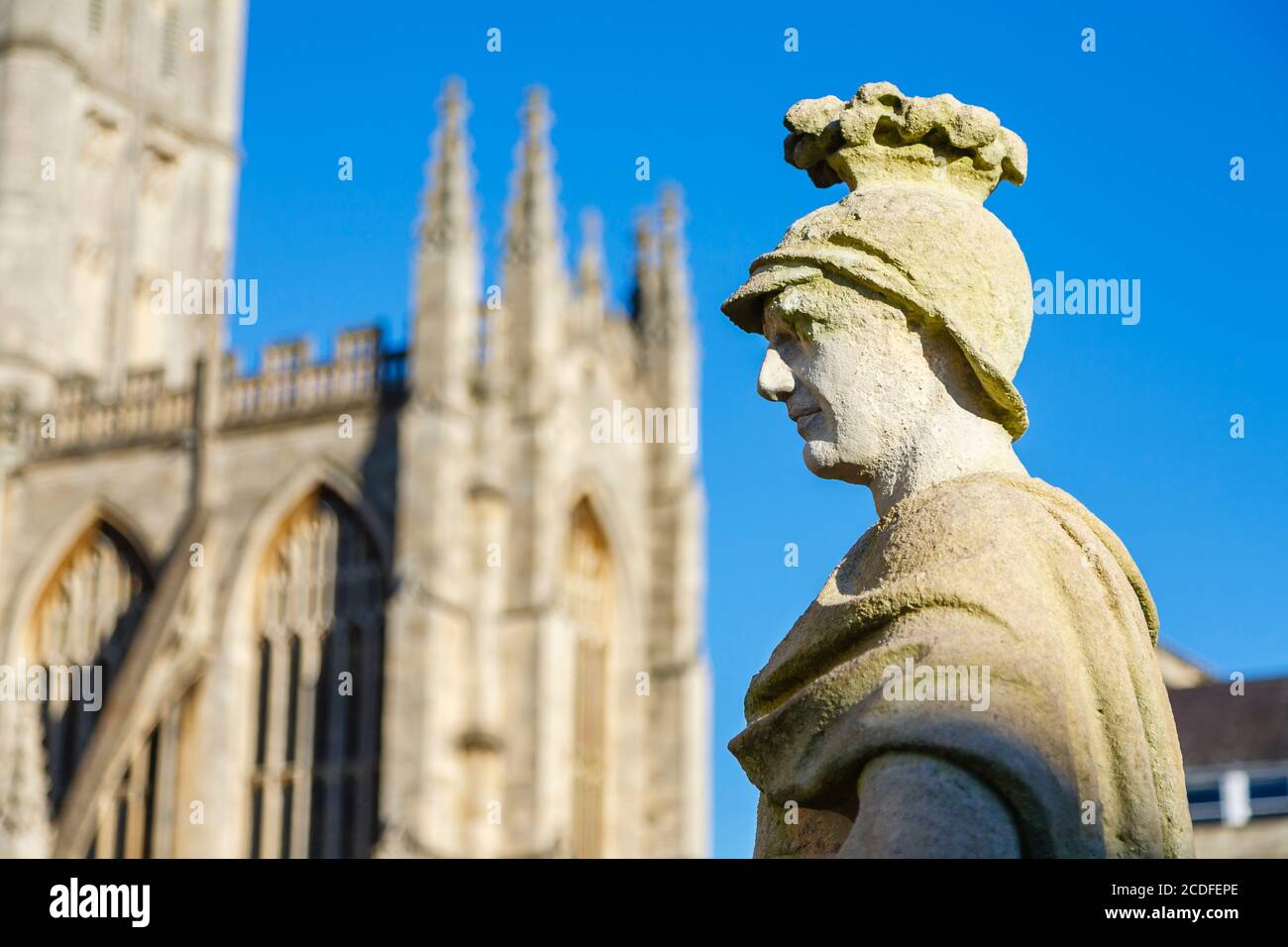 Weathered limestone statue on the terrace at the iconic Roman Baths in ...