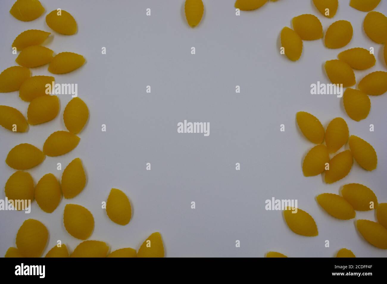 Italian yellow pasta made from durum wheat, vermicelli shells scattered ...