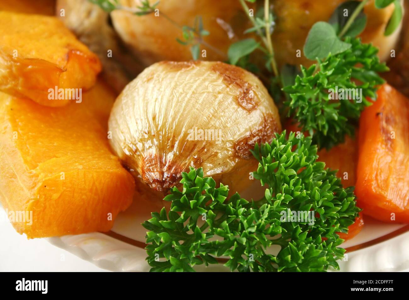 Baked Onion And Pumpkin Stock Photo - Alamy