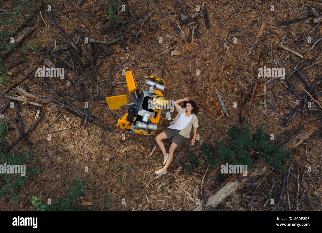 Cosplayer in image of a robot transformer stands among forest next to ...
