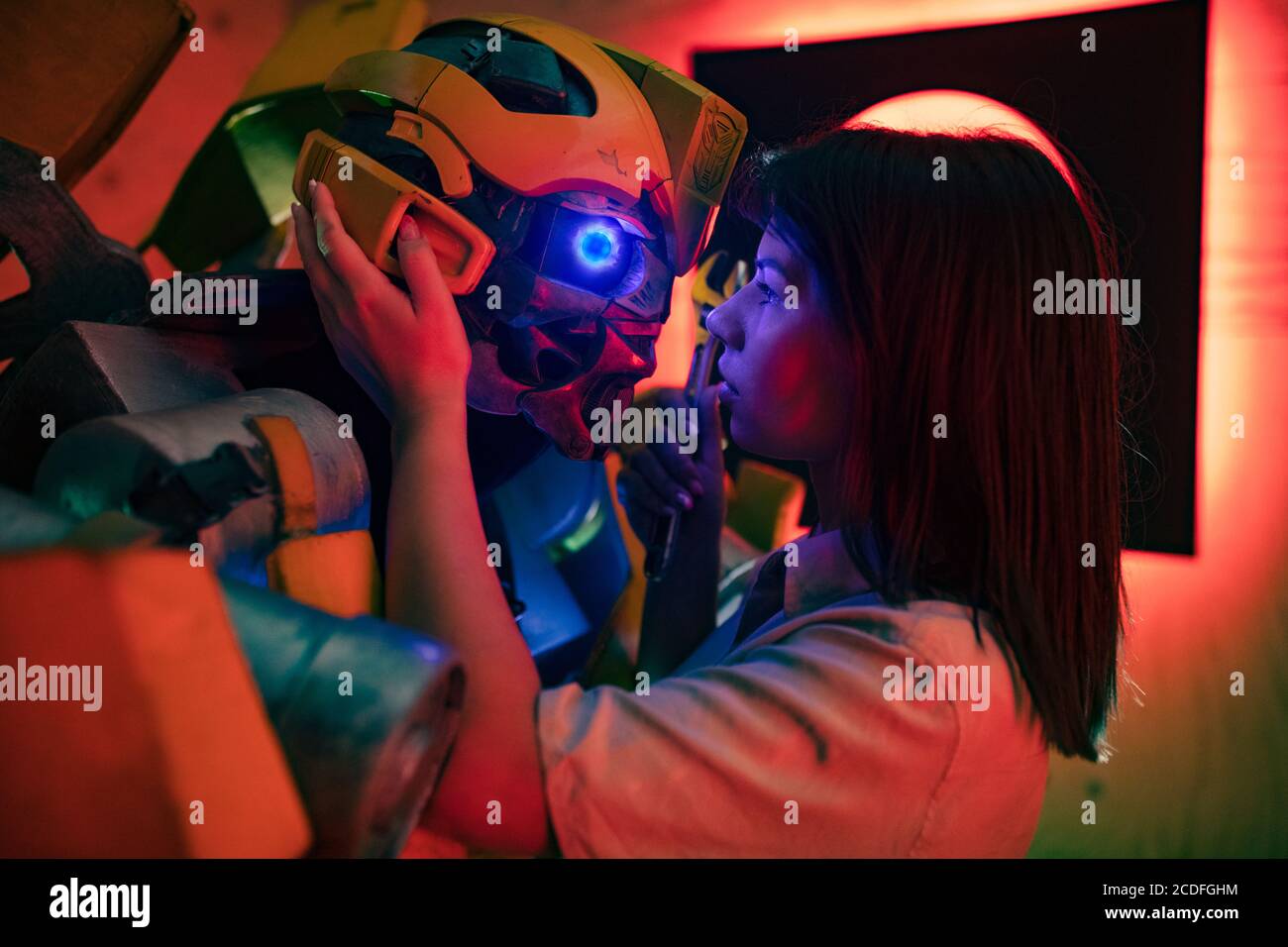 Portrait of robot transformer and girl Stock Photo - Alamy