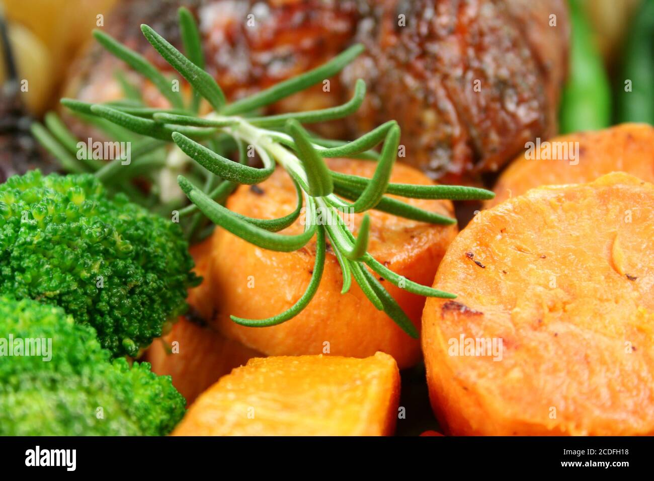 Rosemary And Baked Vegetables Stock Photo - Alamy