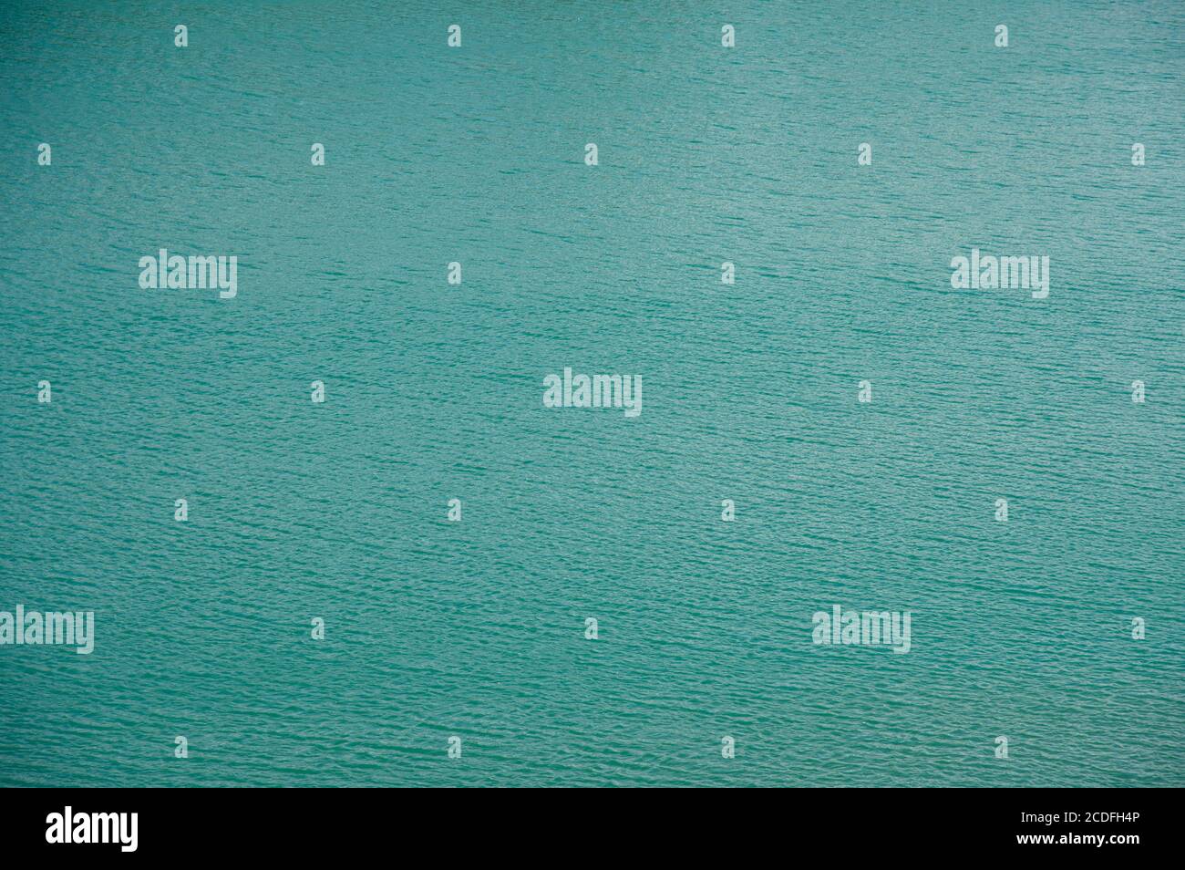 Full frame turquoise lake water as a backdrop Stock Photo - Alamy