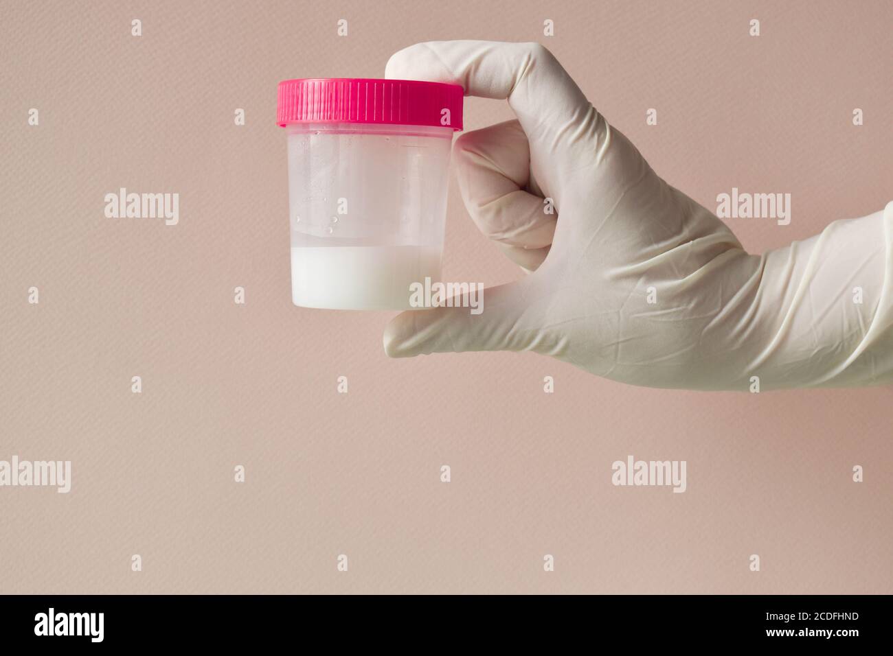 Tests of male fluid in the hand of the doctor in gloves Stock Photo - Alamy
