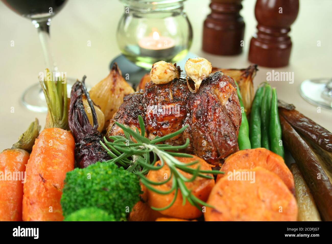 Roast Lamb And Vegetables Stock Photo - Alamy