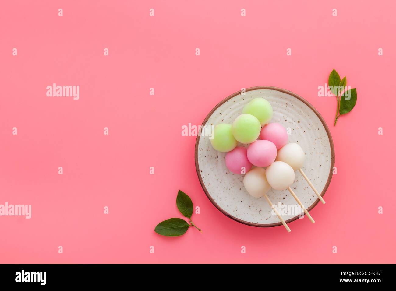 Japanese three colored dumplings Dango on plate, top view Stock Photo ...