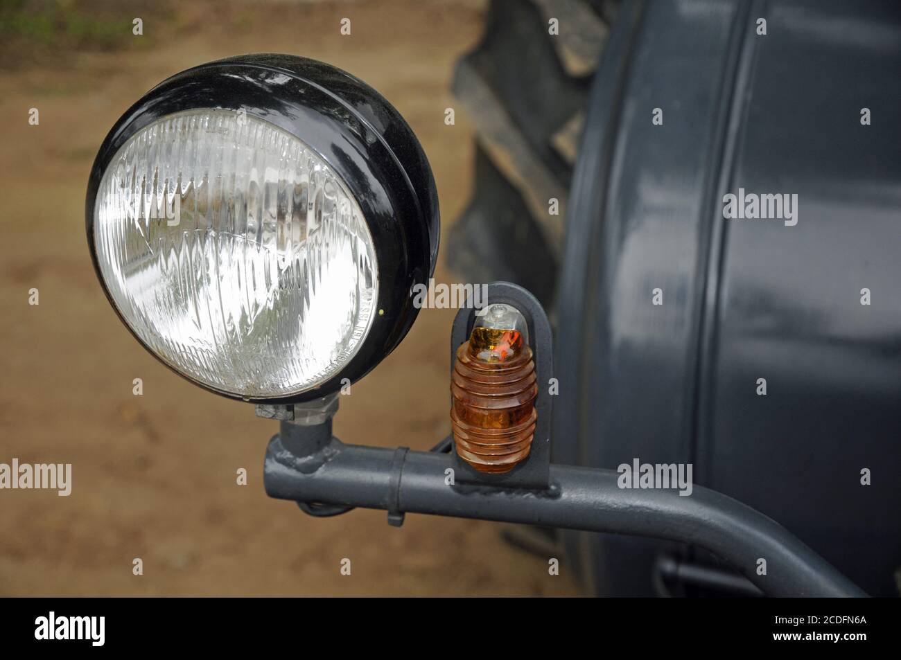 Headlights on old tractor Stock Photo - Alamy
