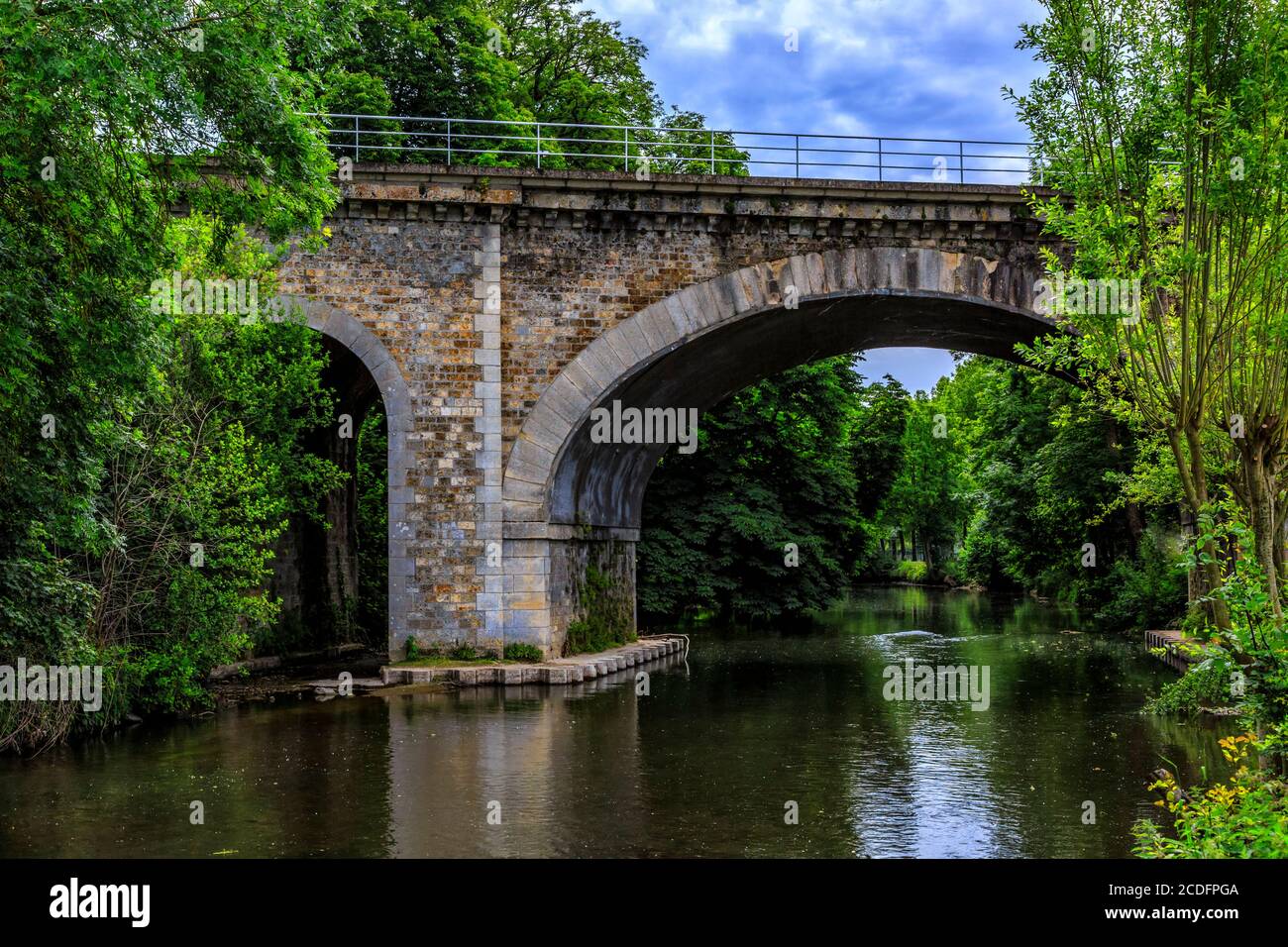 Image of a stone bridge over the Eure River in Central France Stock ...