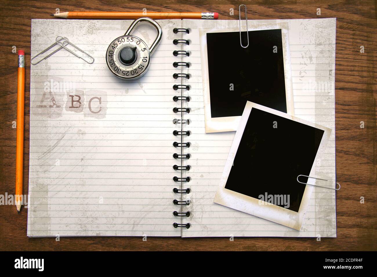 White copy book, pencils and polaroids Stock Photo - Alamy