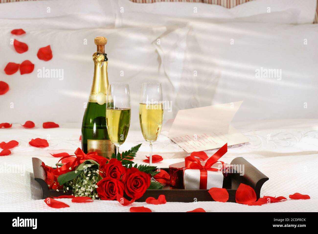 Champagne in bed Stock Photo - Alamy
