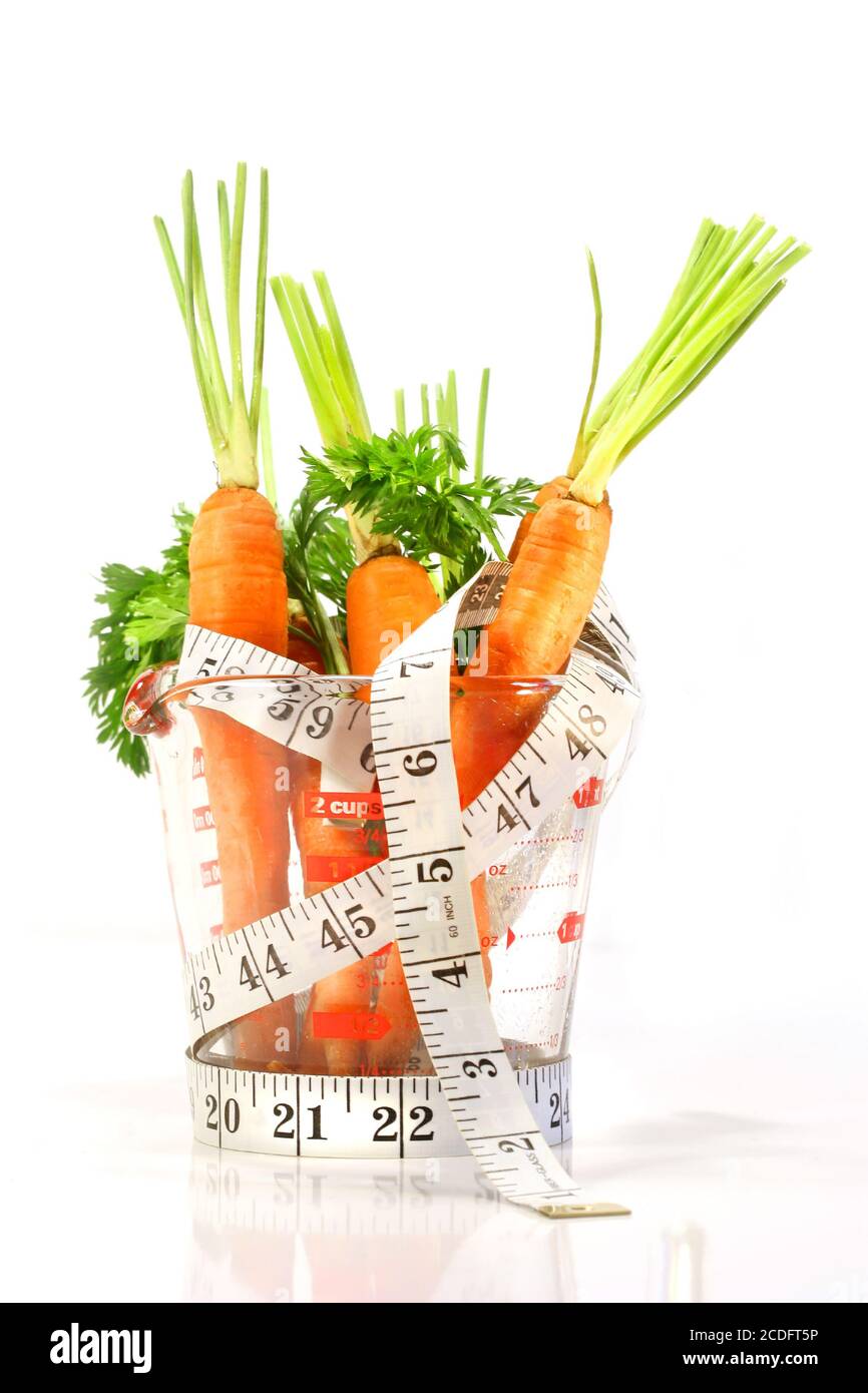 Carrots measuring tape hi-res stock photography and images - Alamy