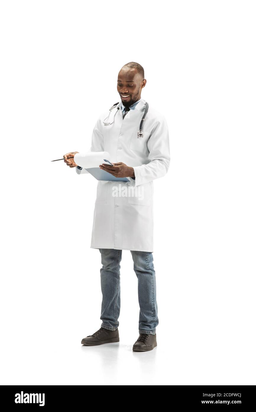 Paperwork. African-american doctor isolated on white background ...