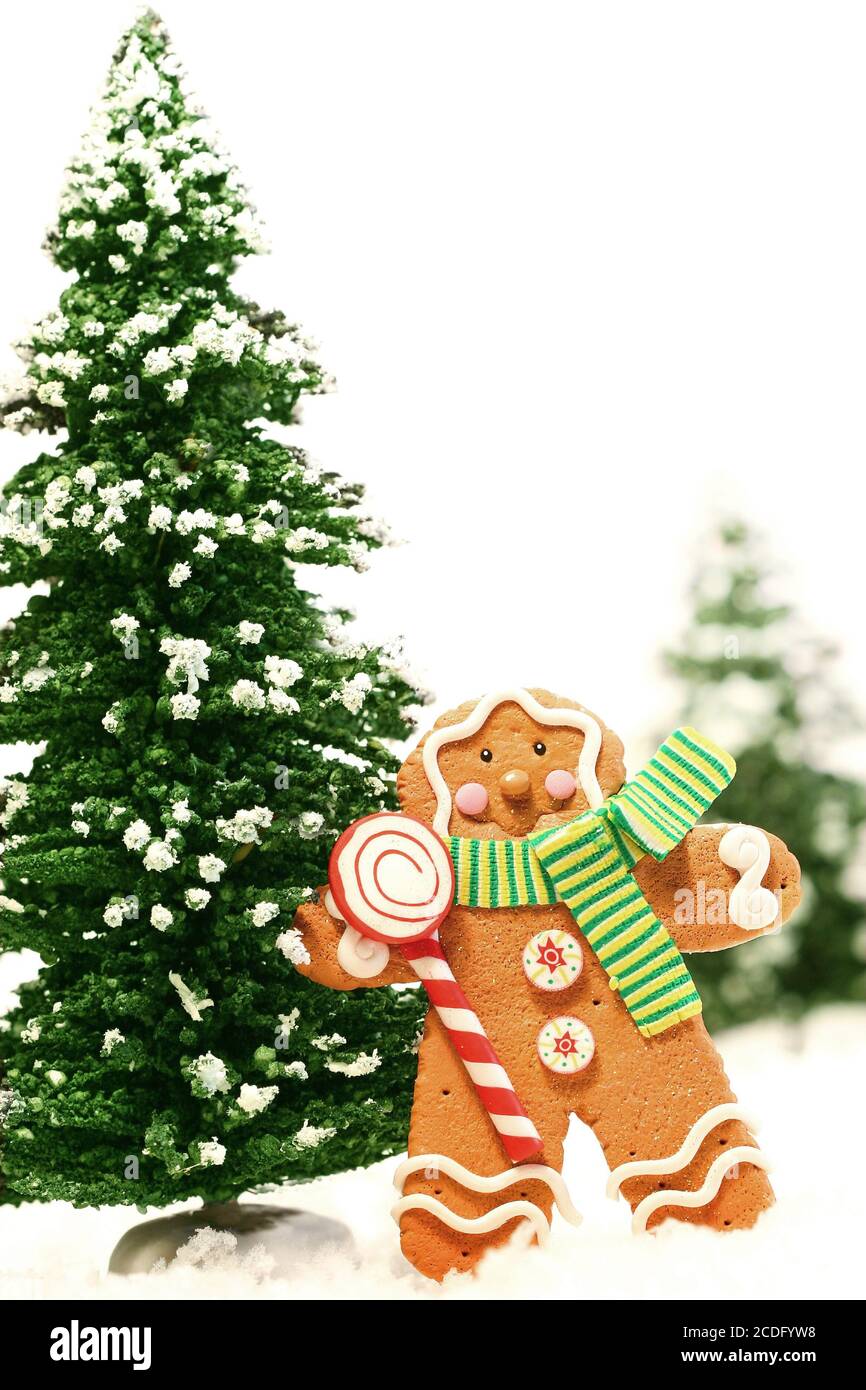 Little gingerbread man with trees Stock Photo - Alamy