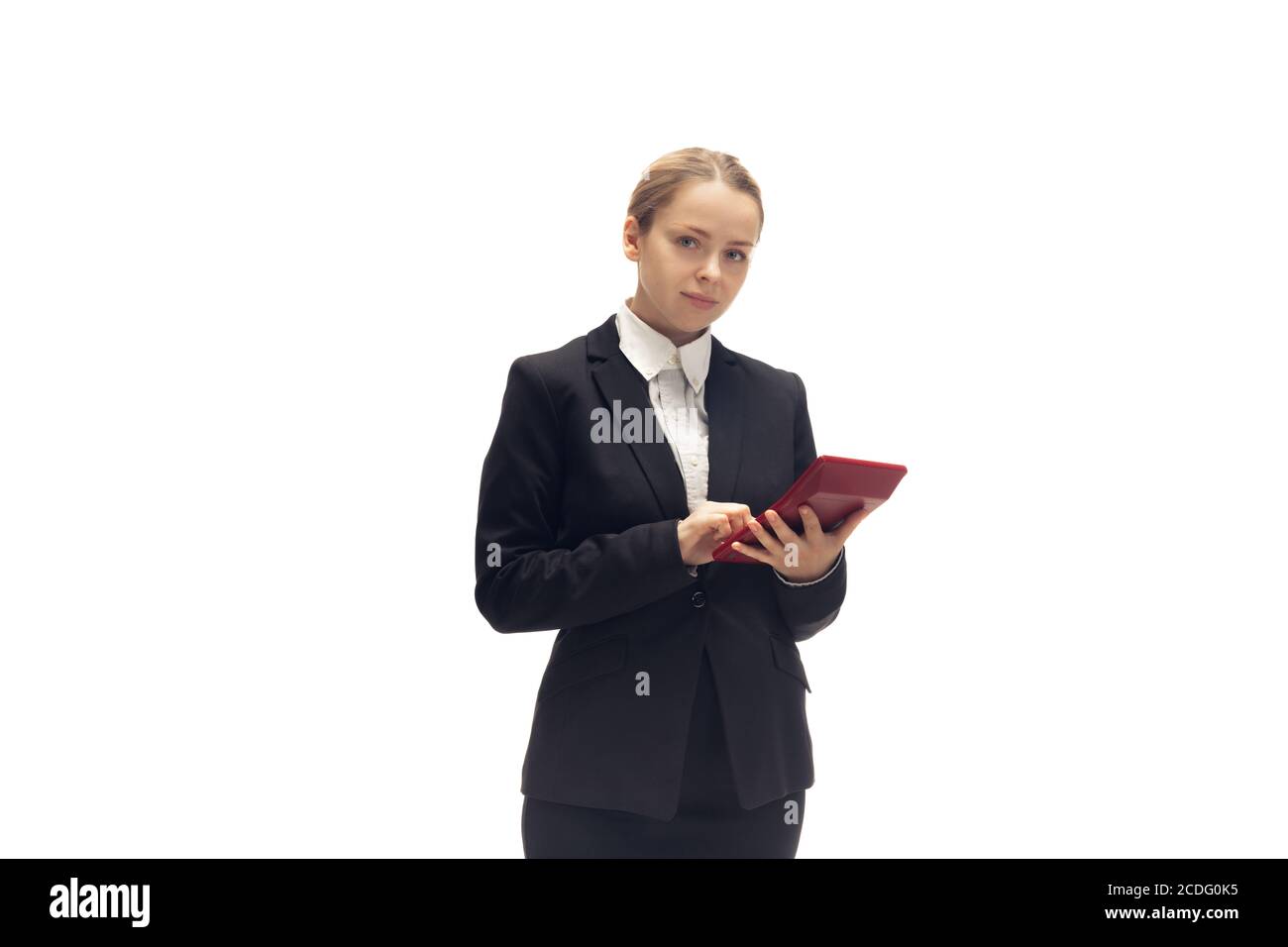 Working with calculator. Young woman, accountant, finance analyst or ...