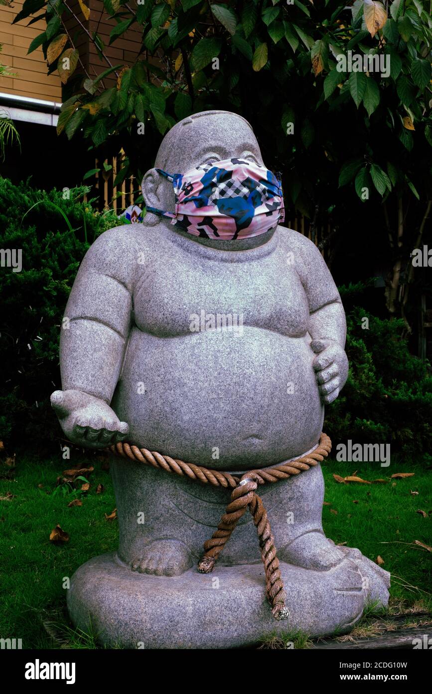 Buddhist statue face mask hi-res stock photography and images - Alamy