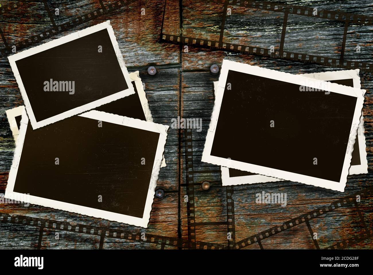 Old photos and film on rustic barm wood Stock Photo - Alamy