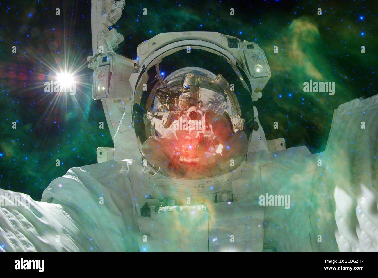 Astronaut. Nebula, cluster of stars in deep space. Science fiction art. Elements of this image ...