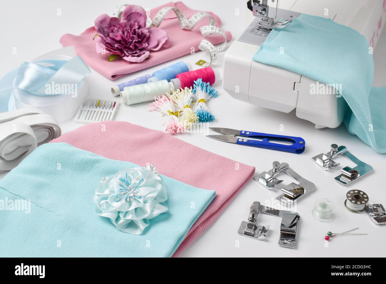 Sewing accessories and spare parts from a sewing machine on white Stock ...
