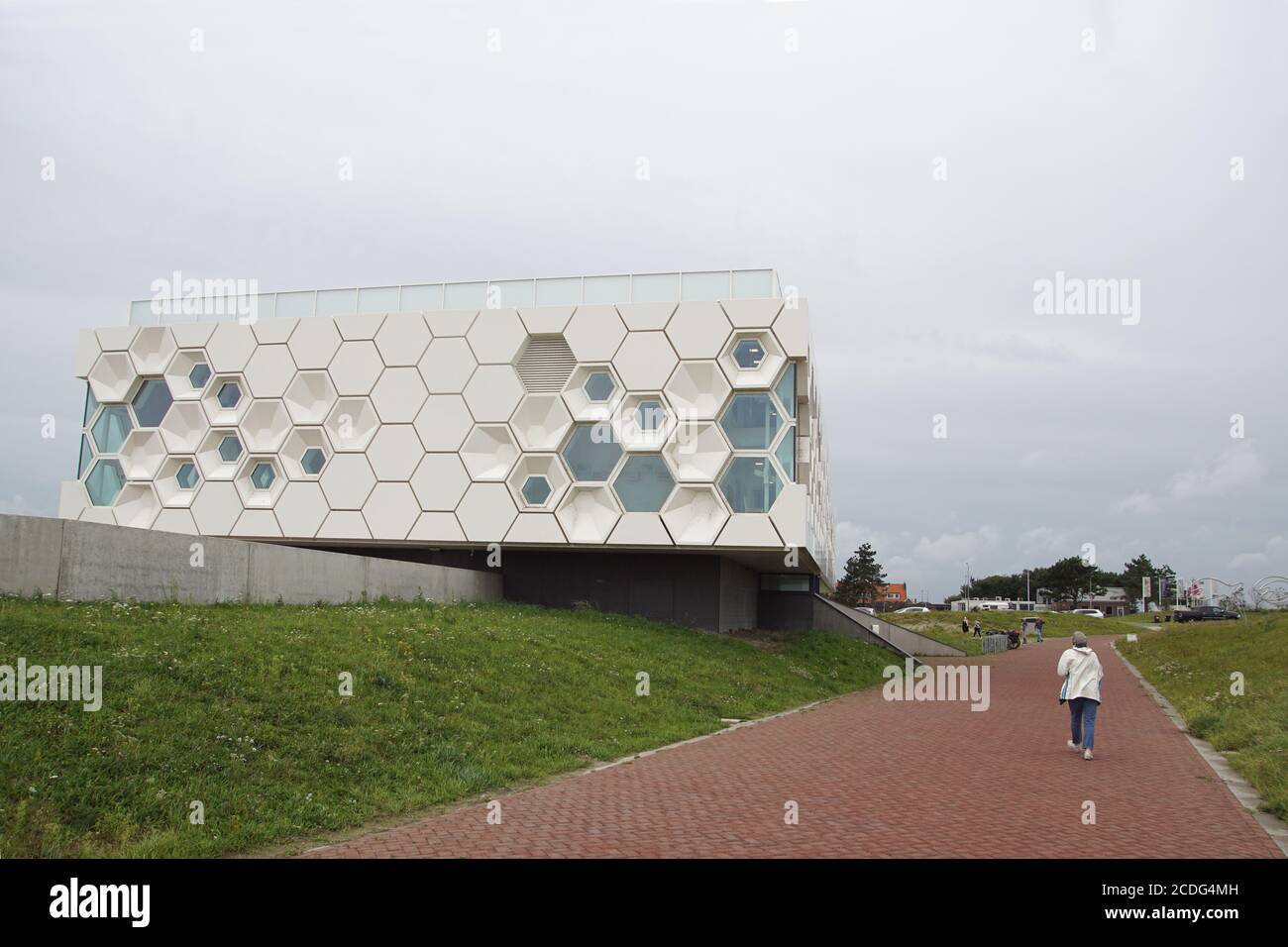 Afsluitdijk Wadden Center, a white, modern building on the Afsluitdijk ...