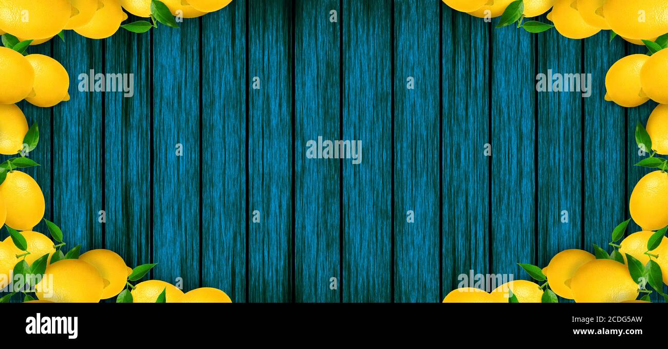 wooden frame lemons poster with copy space on blue wooden background ...
