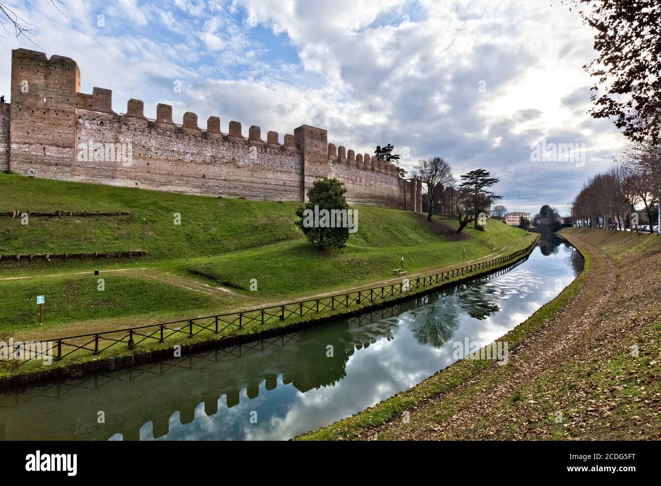 Cittadella: medieval towers and walls are reflected in the moat. Padova ...