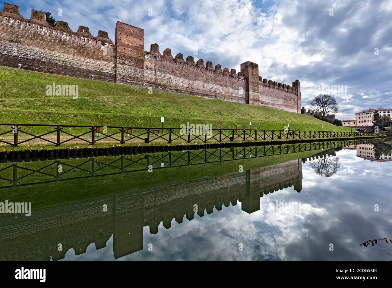 Cittadella: medieval towers and walls are reflected in the moat. Padova ...