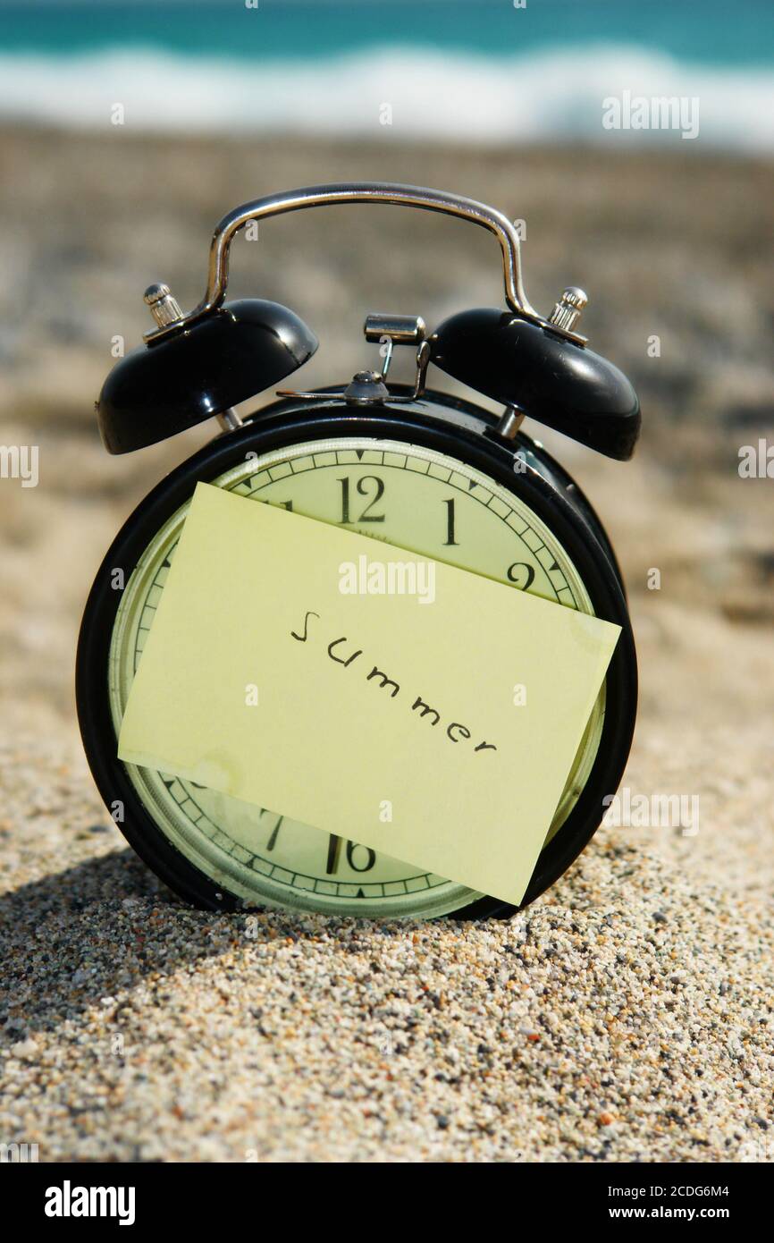clock at beach Stock Photo - Alamy