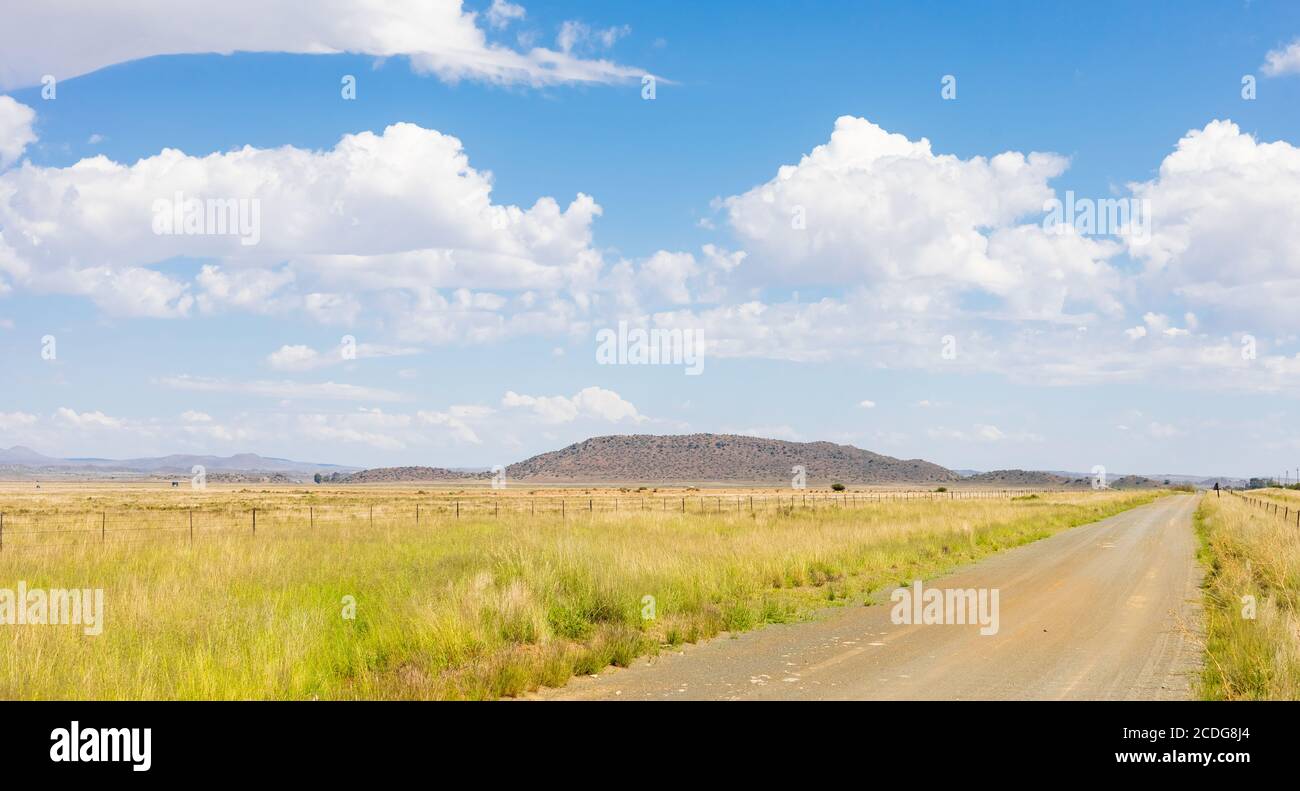 View of an empty country highway road in South African Farmland region ...
