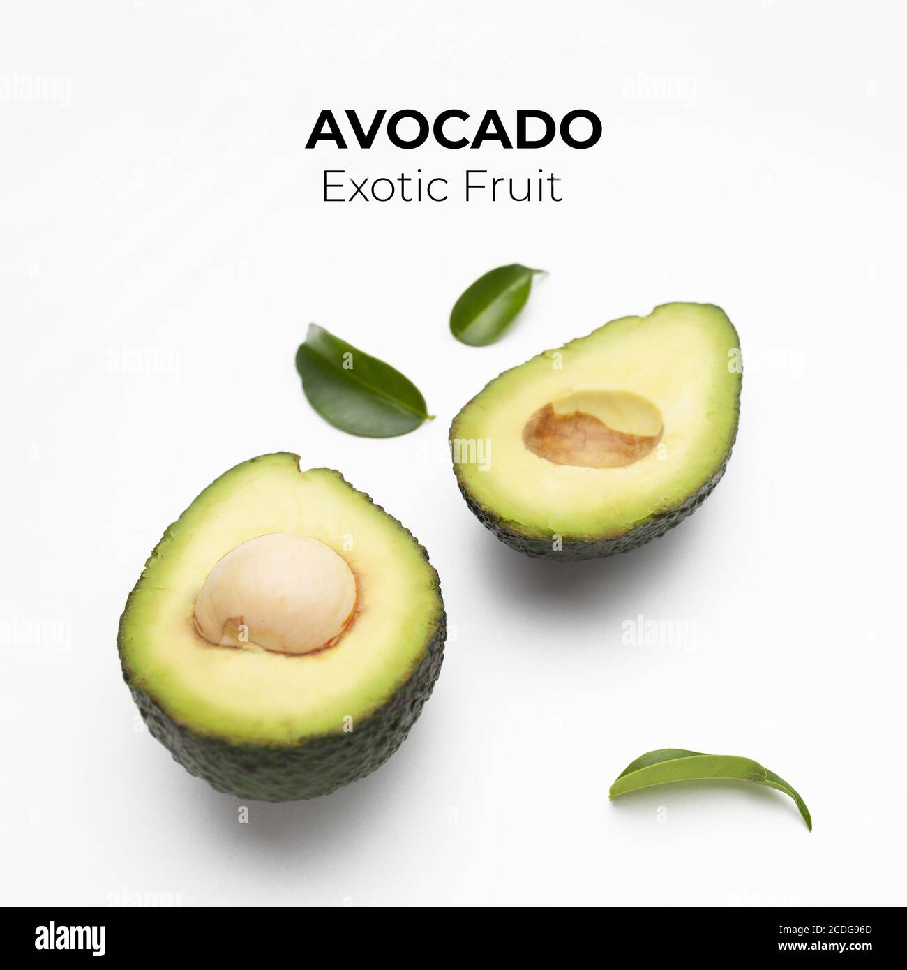 Avocado cut in half isolated on a white background Stock Photo - Alamy