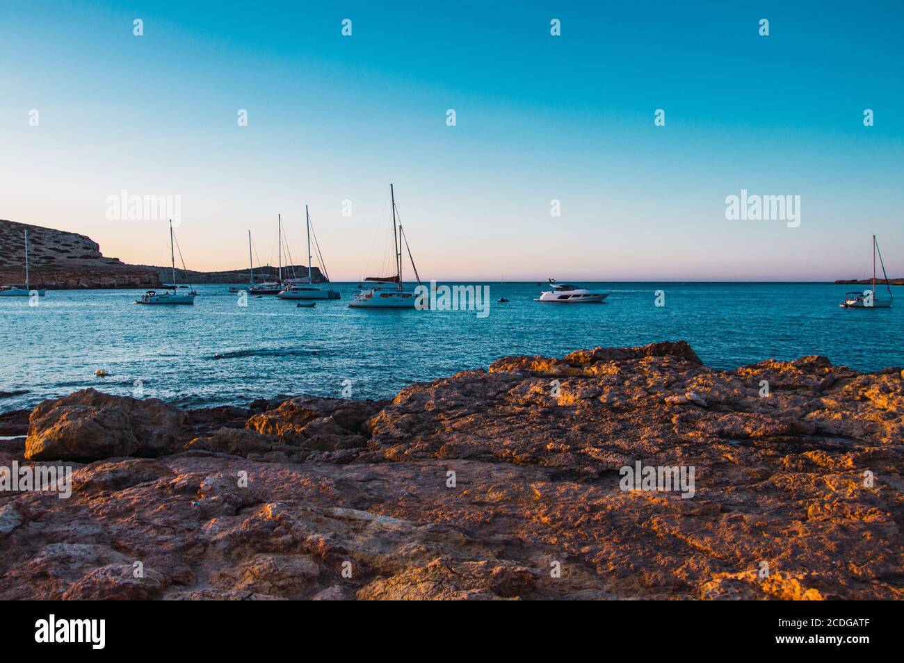 Fire sunset over ocean rocky hi-res stock photography and images - Alamy