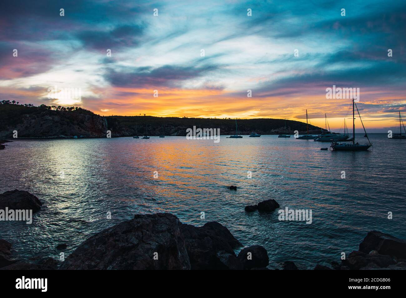 Mesmerizing view of an adorable sunset over a sea Stock Photo - Alamy