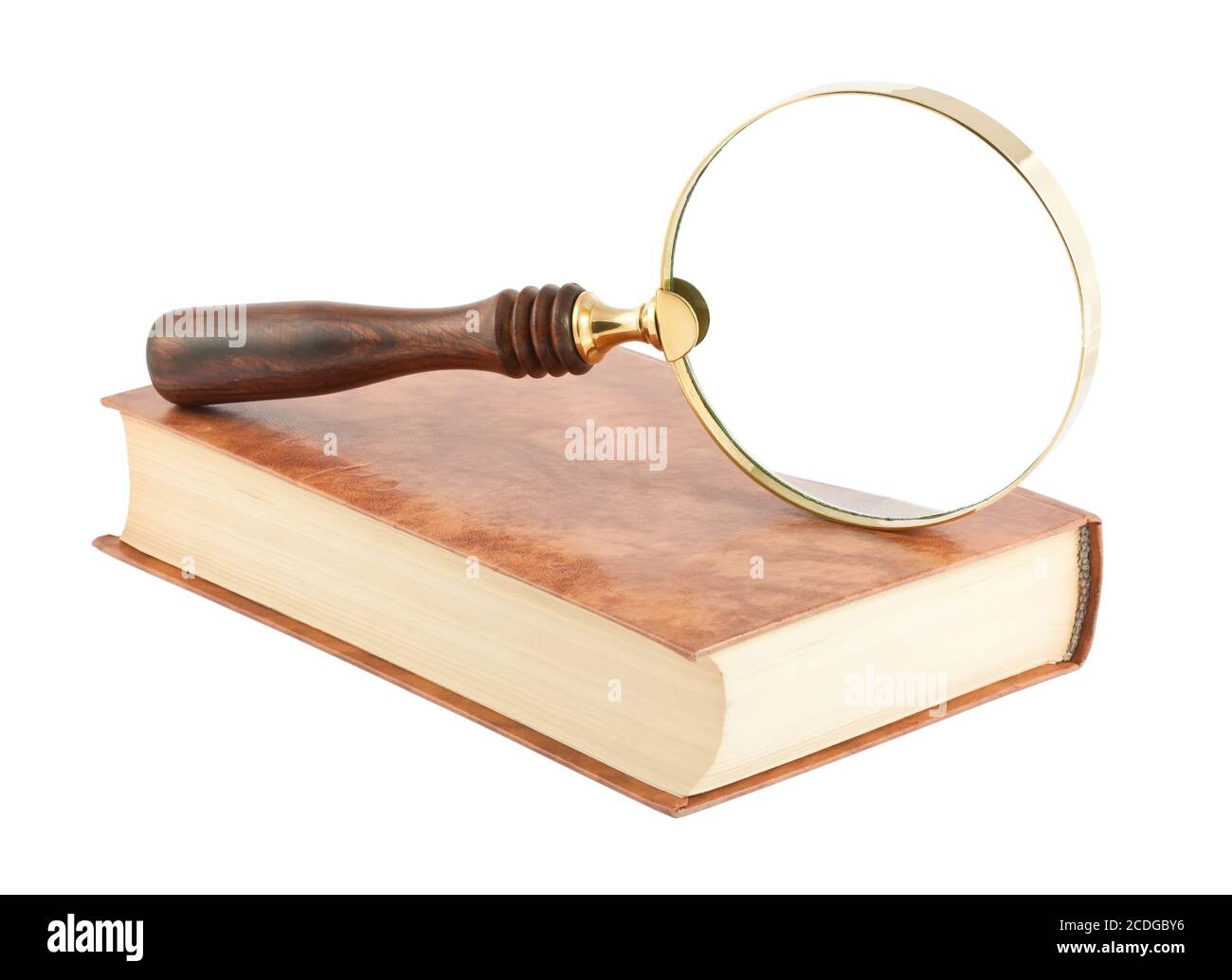 Magnifying glass on the book Stock Photo - Alamy