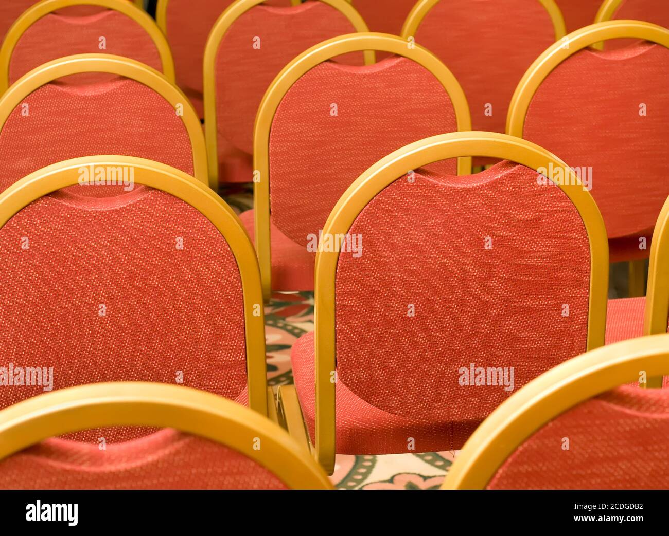 Rows of red Chairs in the conference hall Stock Photo - Alamy