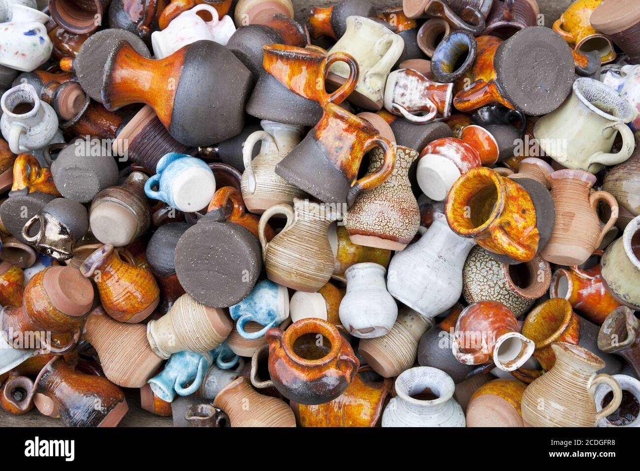 Small ceramic jugs and cups macro Stock Photo - Alamy