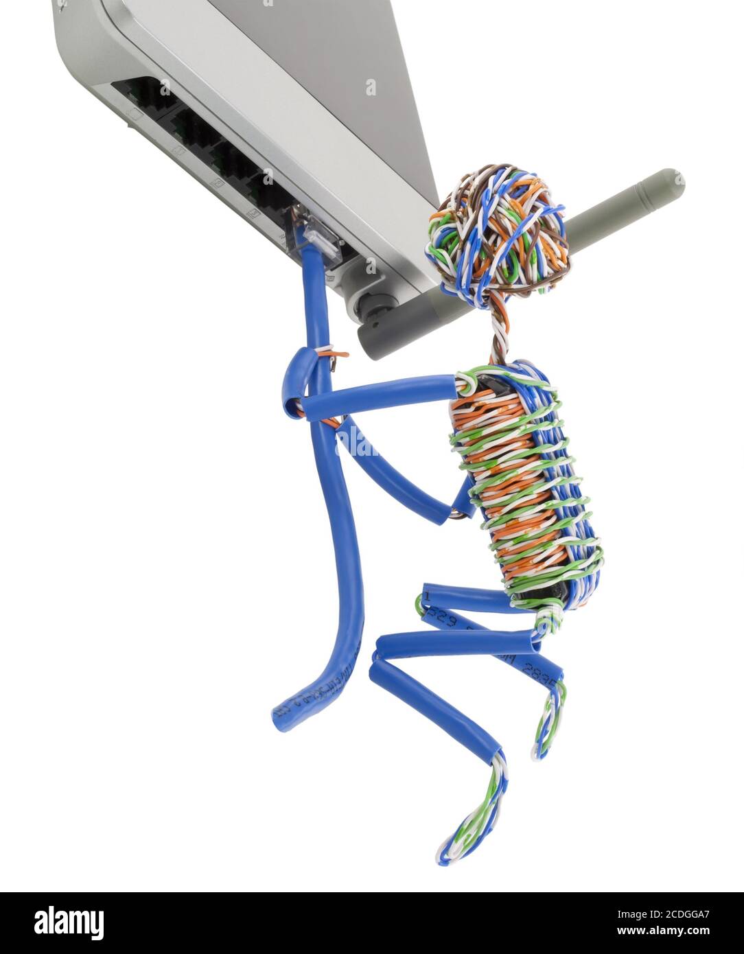 Toy little man clings to the Internet router device Stock Photo - Alamy
