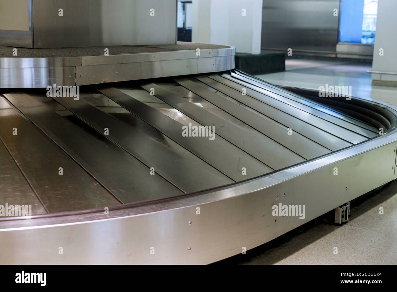 Empty baggage claim area at check-in desk at airport Stock Photo - Alamy