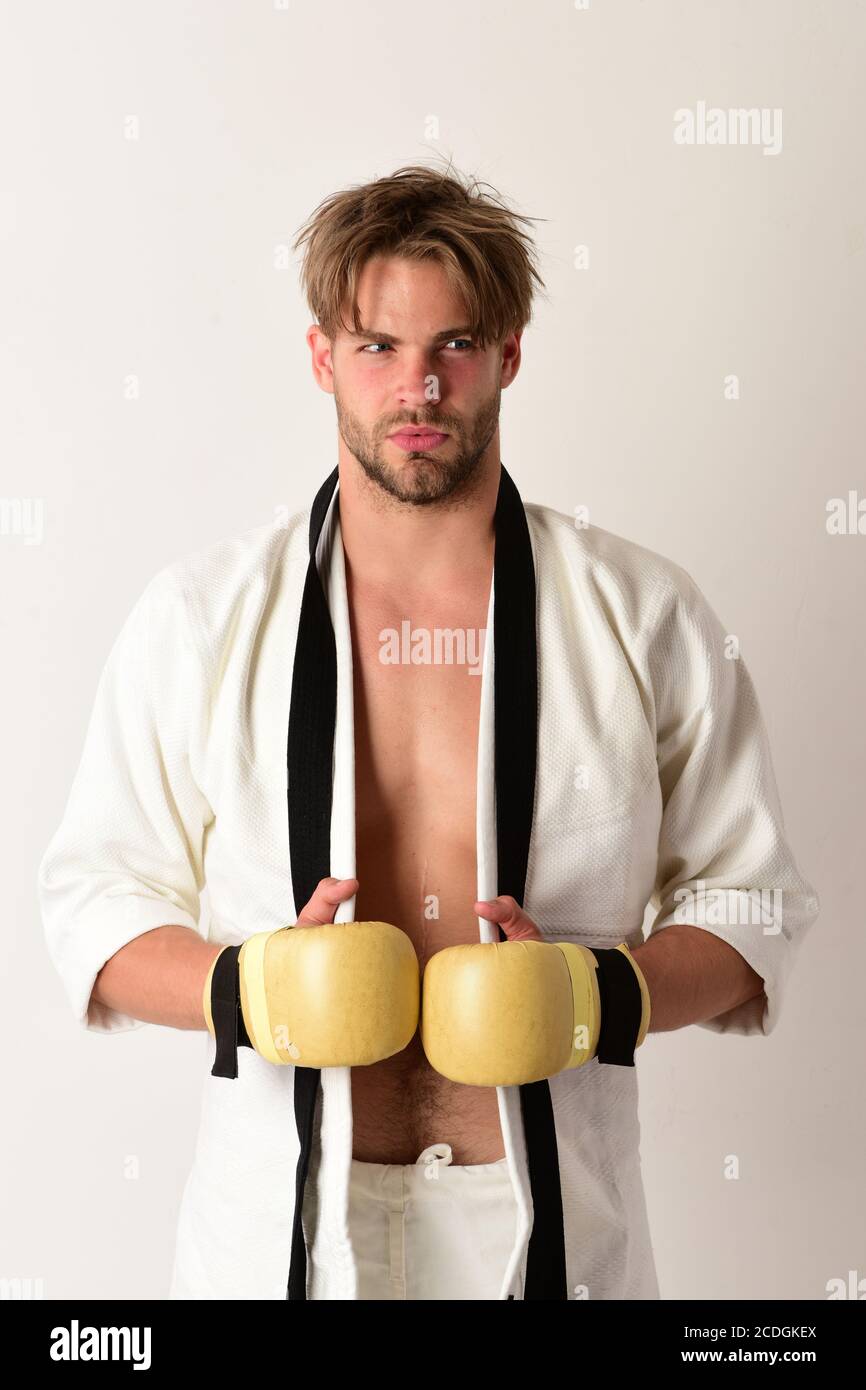 MMA fighter with strong body practices martial arts. Man with tricky ...