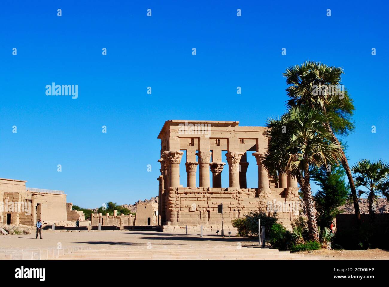 Tourists visit Trajan's Kiosk, Philae Temple pavilion at Agilkia Island ...