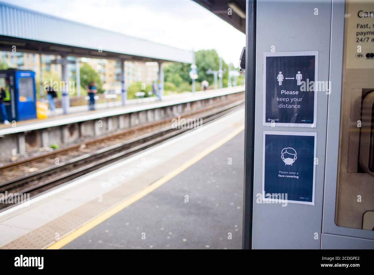 Covid 19 signs on the southeastern railway network in Kent,UK. During ...