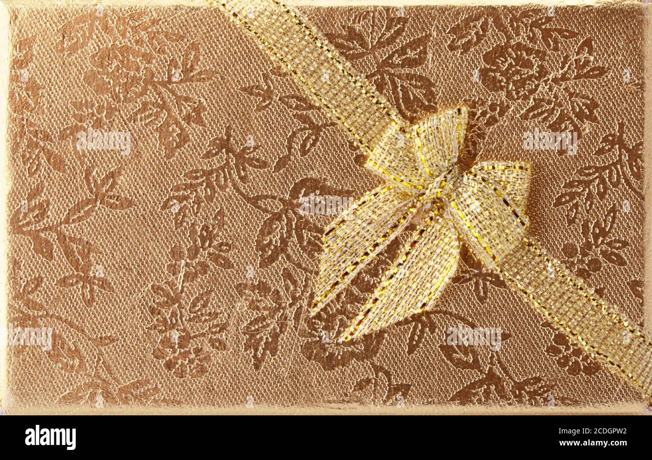 A Background of Gold Diagonal Ribbon on Foil Stock Photo - Alamy