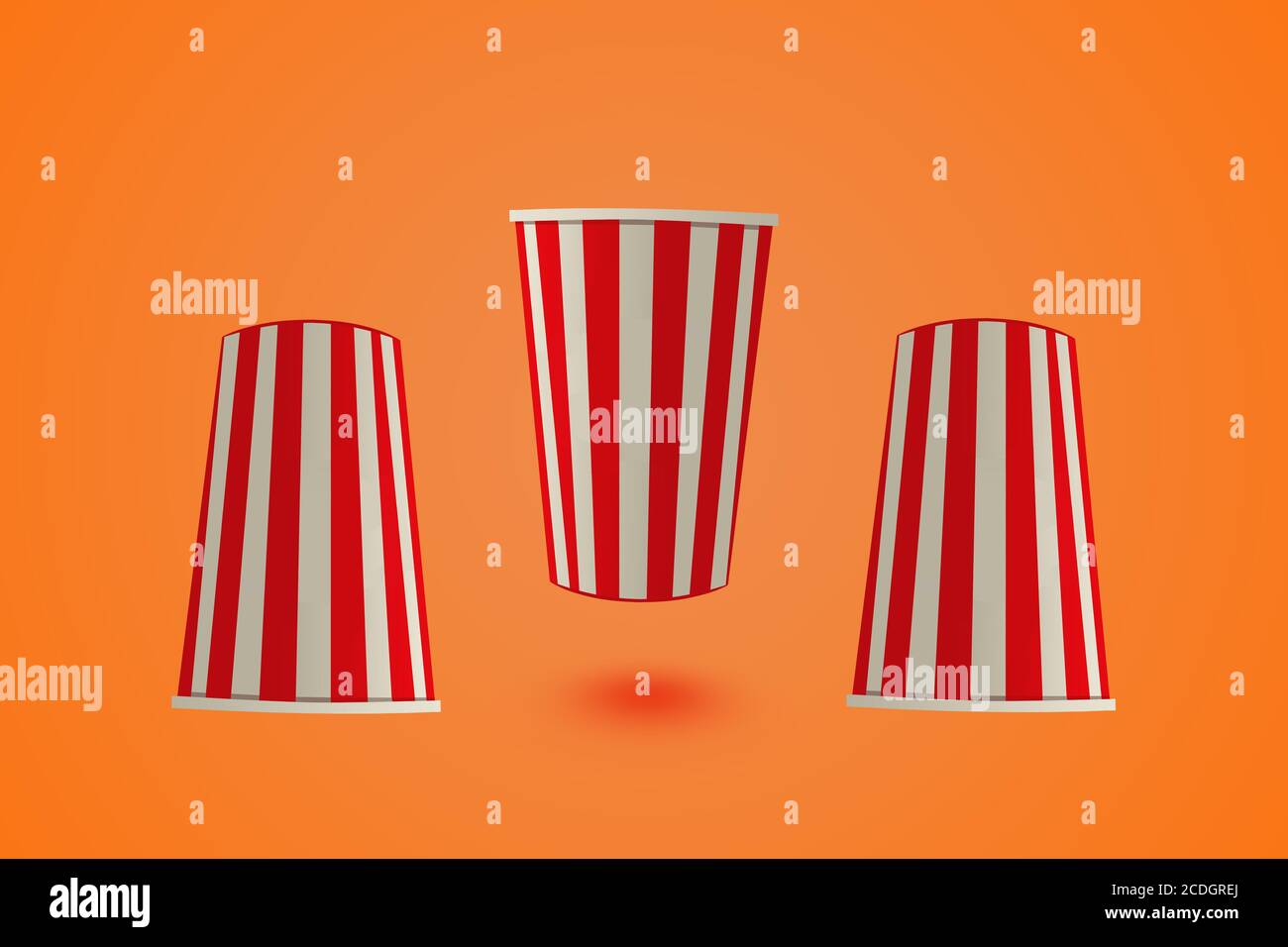 three popcorns on orange background with one different spatial popcorn ...