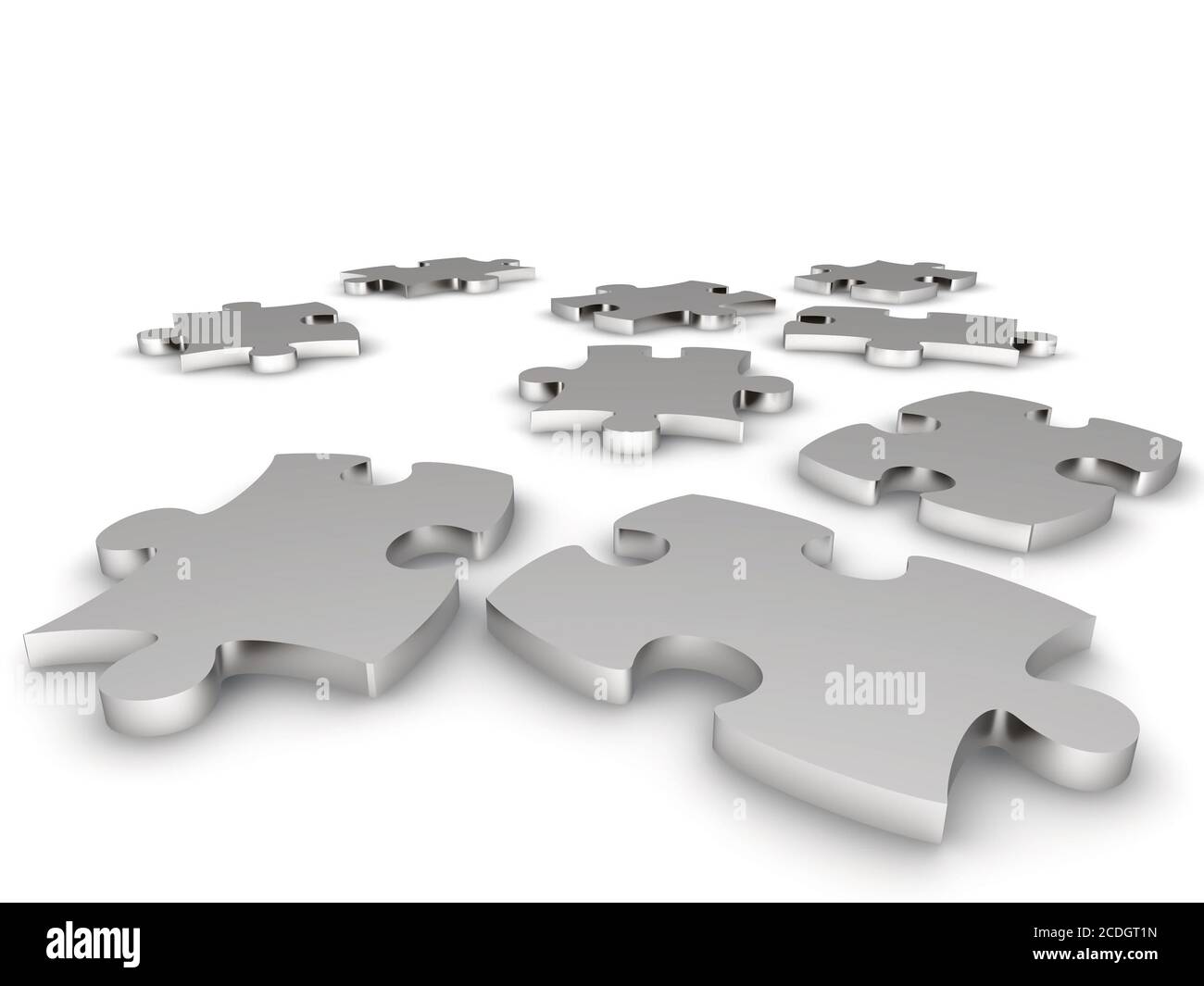 Metal components of a puzzle on a white background Stock Photo - Alamy