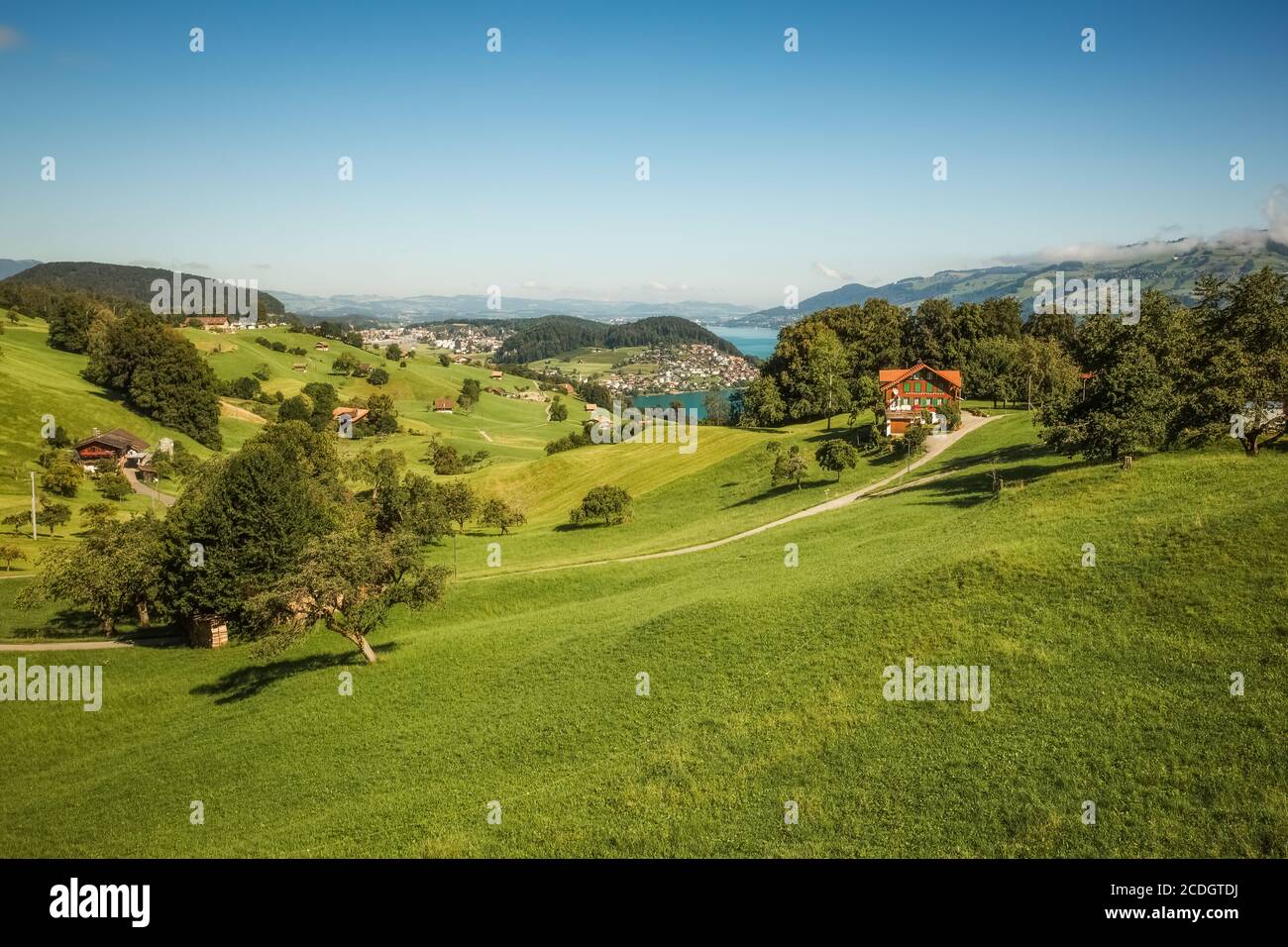 Landscape in the countryside on a bright day, near Lake Thun and ...