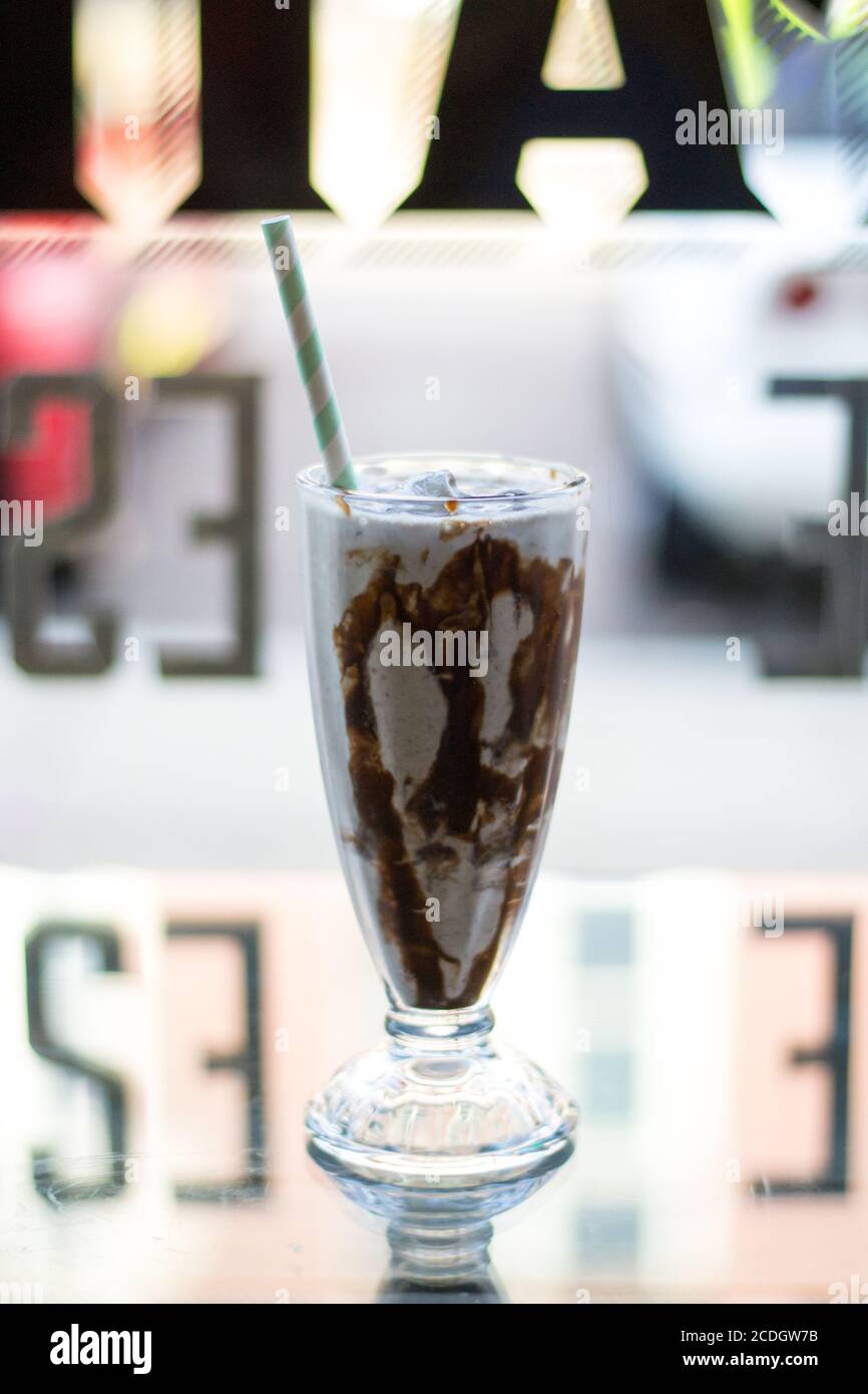 Chocolate milkshake in a restaurant Stock Photo - Alamy