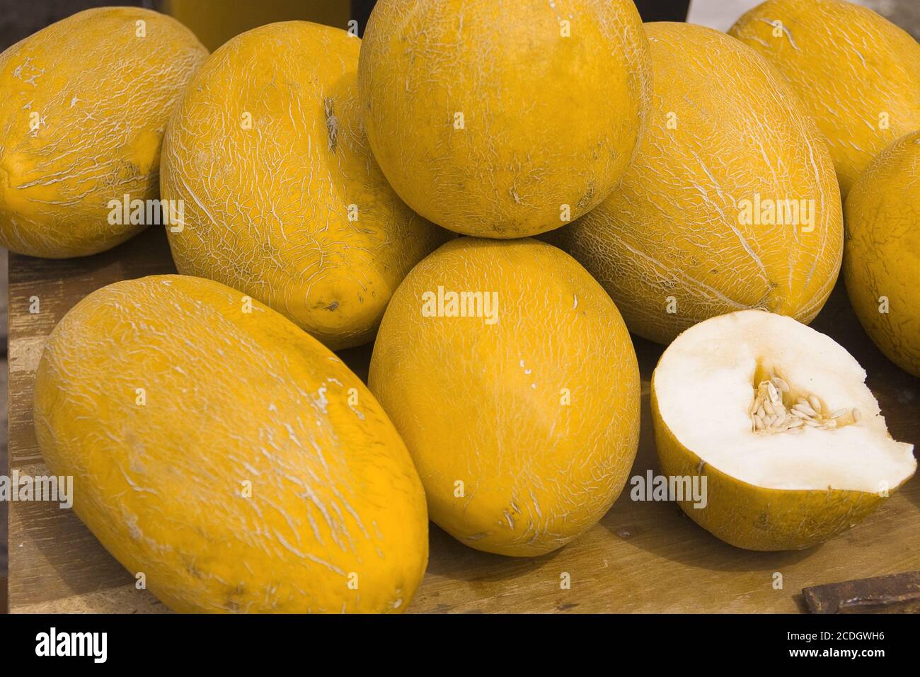 Oval fruits of a ripe and juicy melon with a yello Stock Photo - Alamy