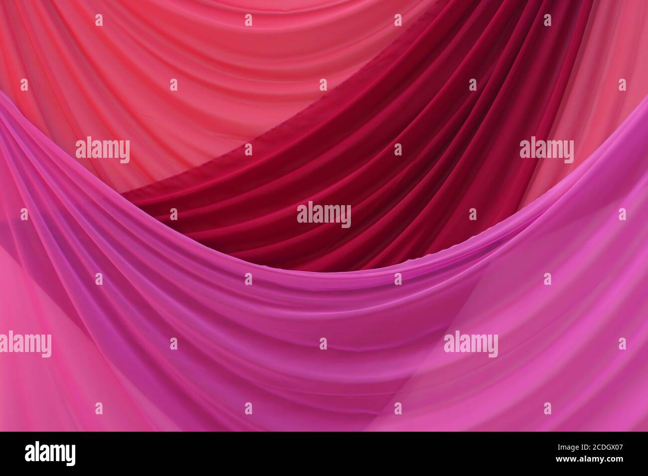 Red and purple curtains in an assembly hall on sol Stock Photo - Alamy