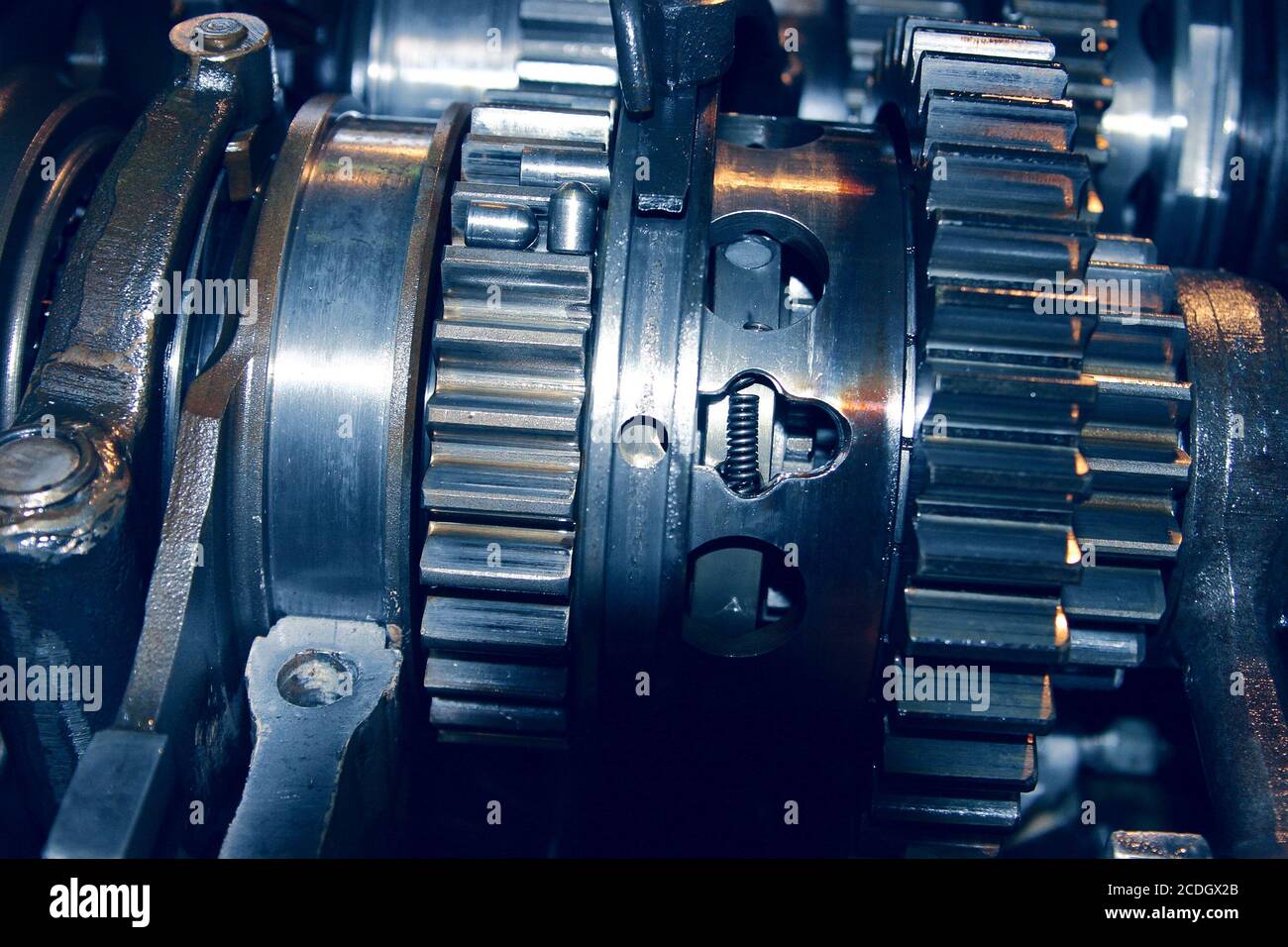 Set linked metal gears the automobile mechanism in Stock Photo - Alamy