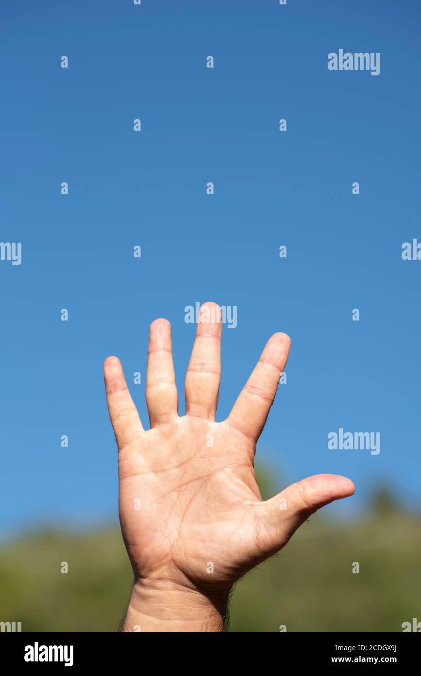 Hands stopping man hi-res stock photography and images - Alamy