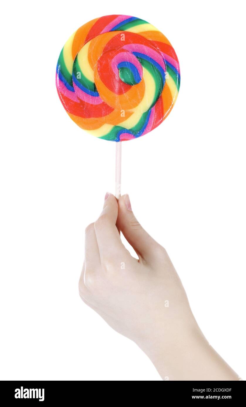 Hand holding lollipop isolated over white Stock Photo - Alamy